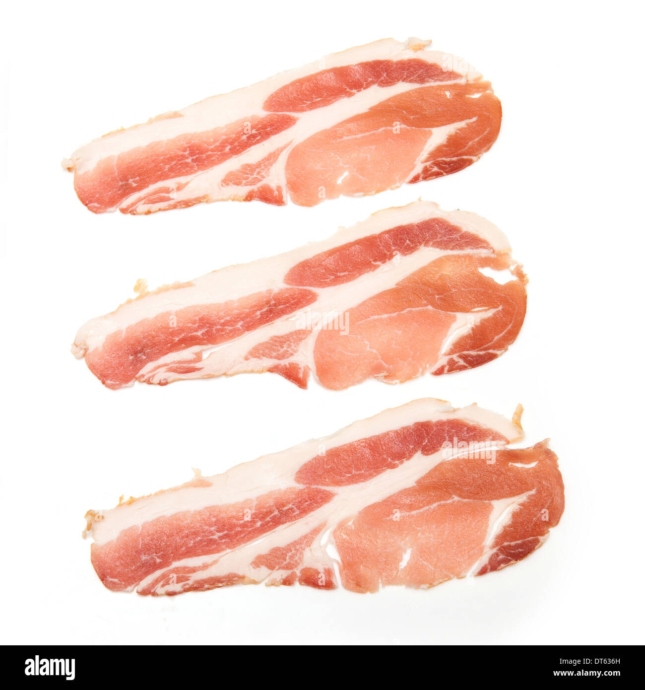 Applewood smoked bacon rashers isolated on a white studio background ...
