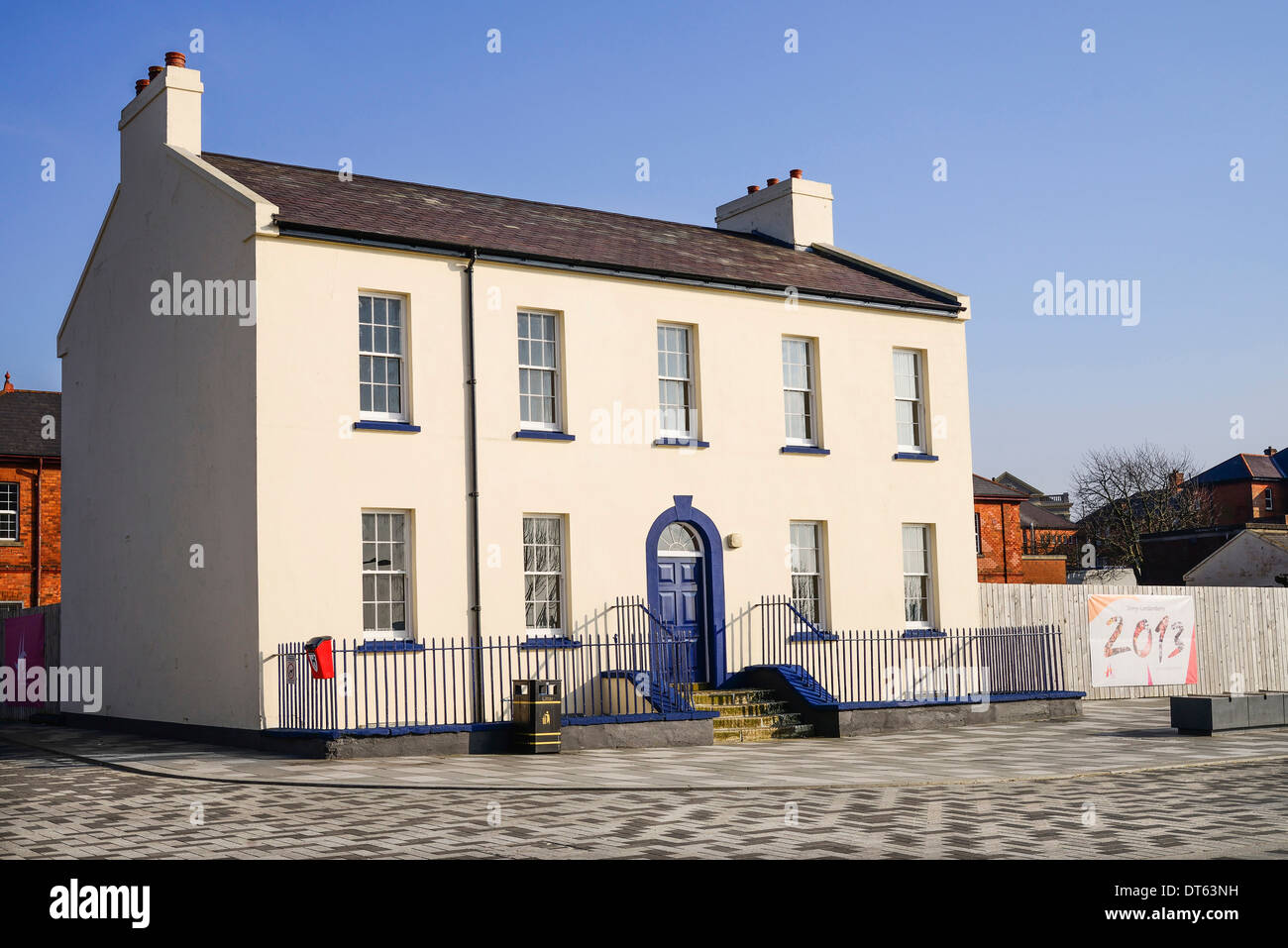 Ireland, Derry, Former Ebrington Barracks building with blue doorway ...