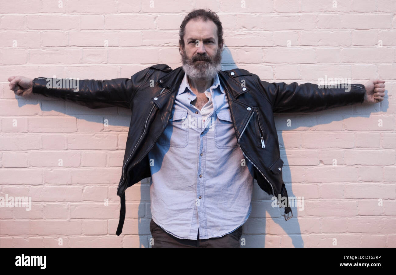 Man portrait brick wall hi-res stock photography and images - Alamy