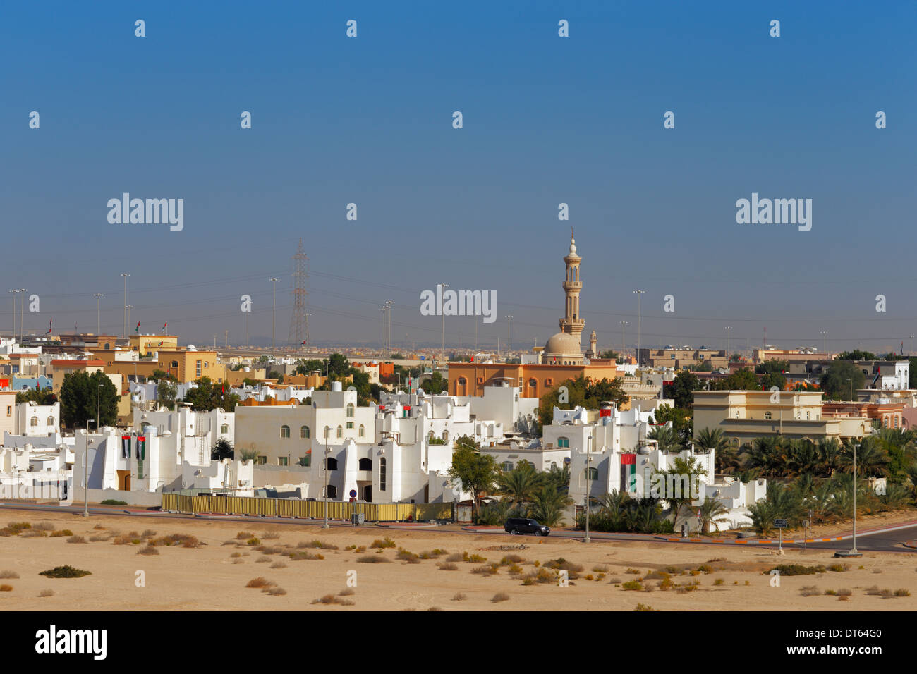Abu Dhabi, UAE: A suburban view of urban housing and a local mosque ...