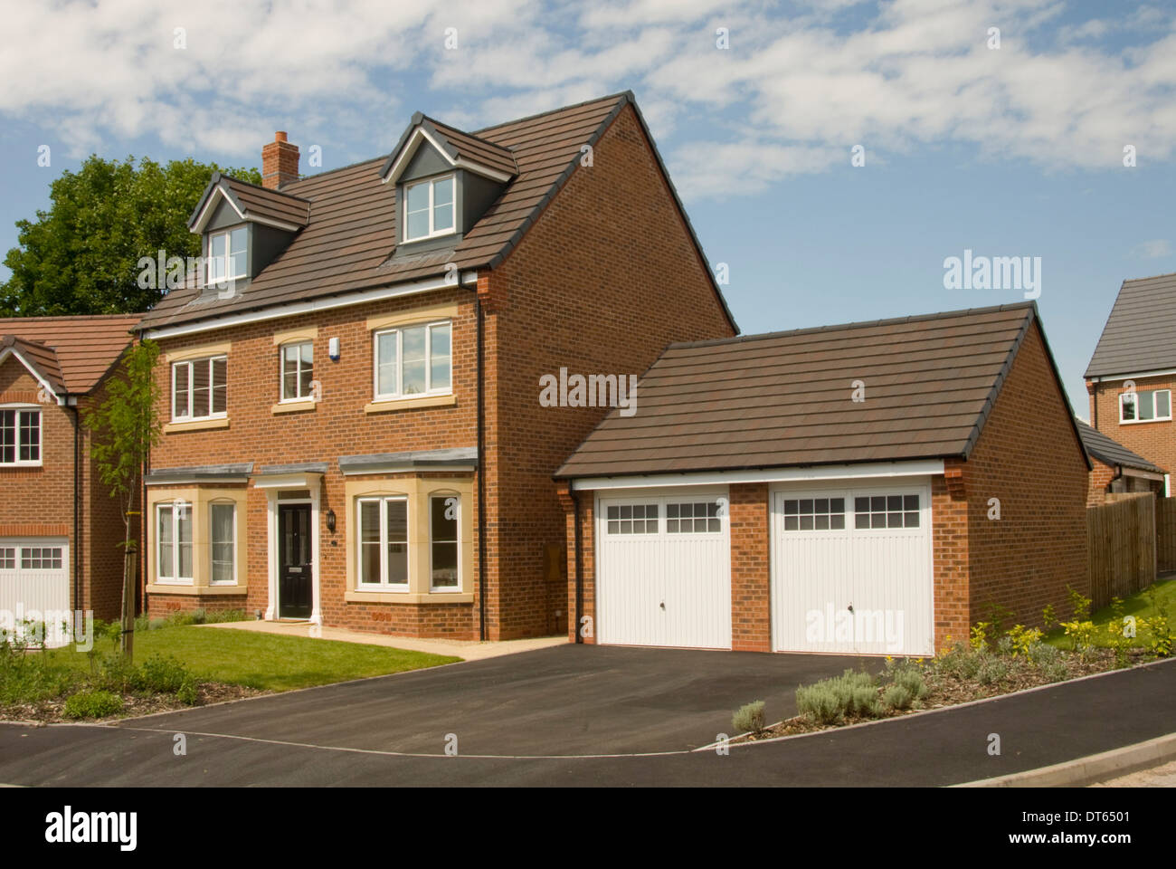 New build red brick detached house Stock Photo - Alamy