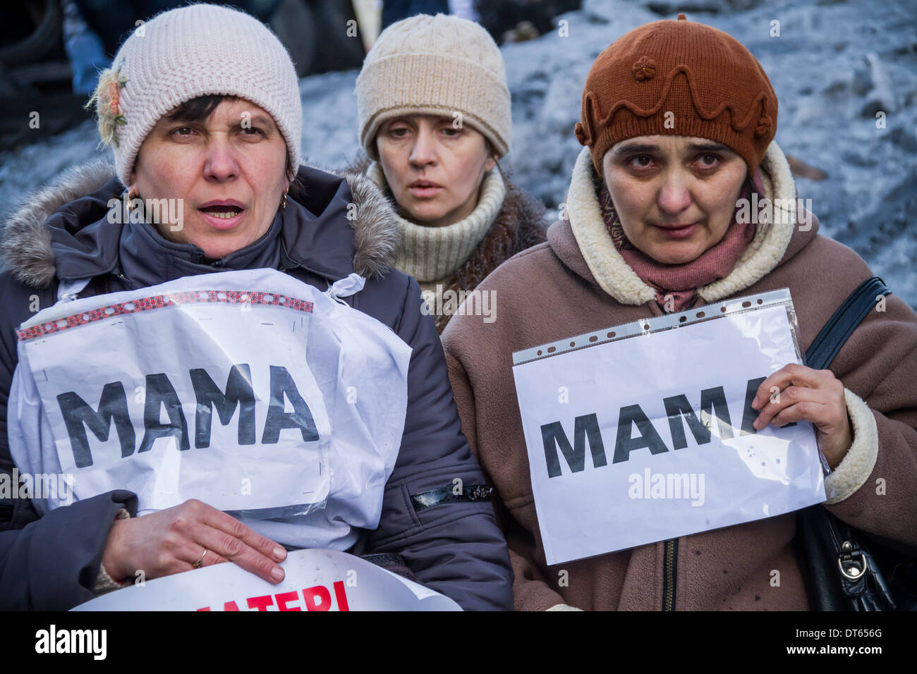 Mothers ('mama') supporters of Euromaidan pray during an emotional ...