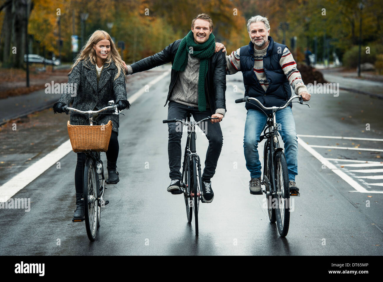 Young female friends cycling hi-res stock photography and images - Alamy