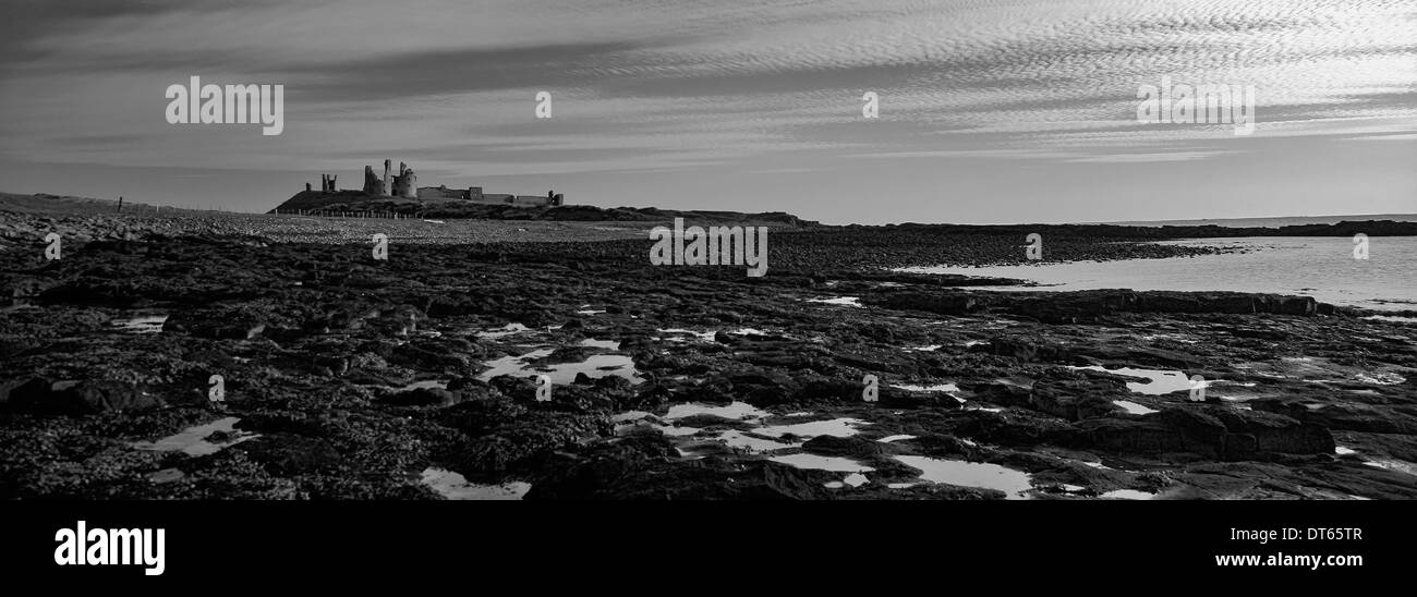 Dunstanburgh castle beach hi-res stock photography and images - Alamy