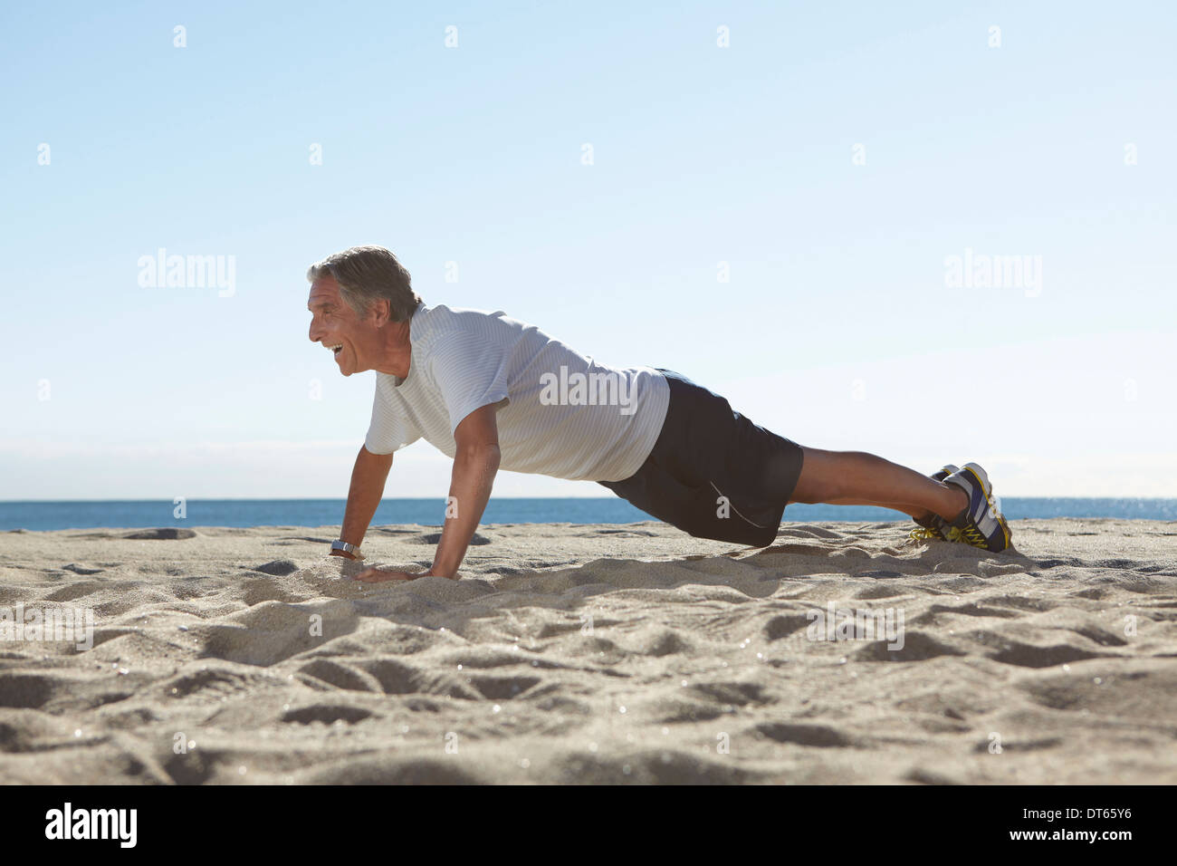Old man on beach hi-res stock photography and images - Alamy