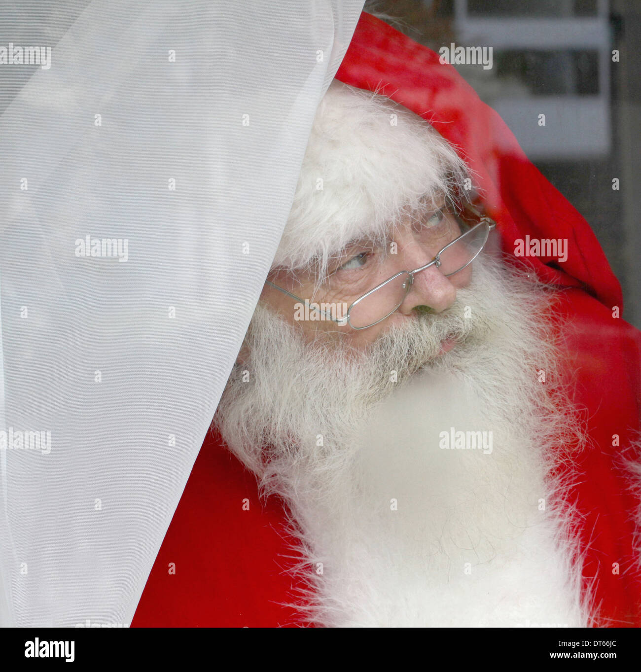 Blow Up Santa Looking In Window