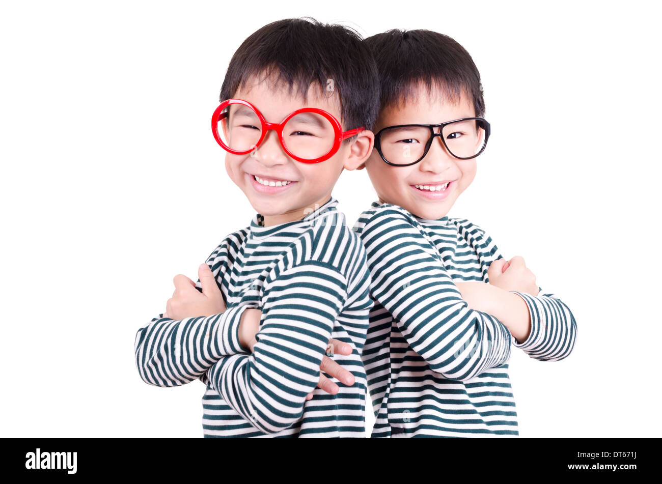Two brother smiling on white background Stock Photo - Alamy