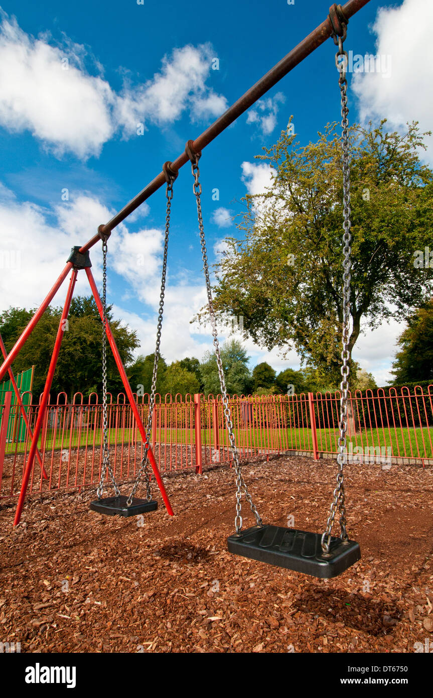 Childrens playground swing Stock Photo - Alamy
