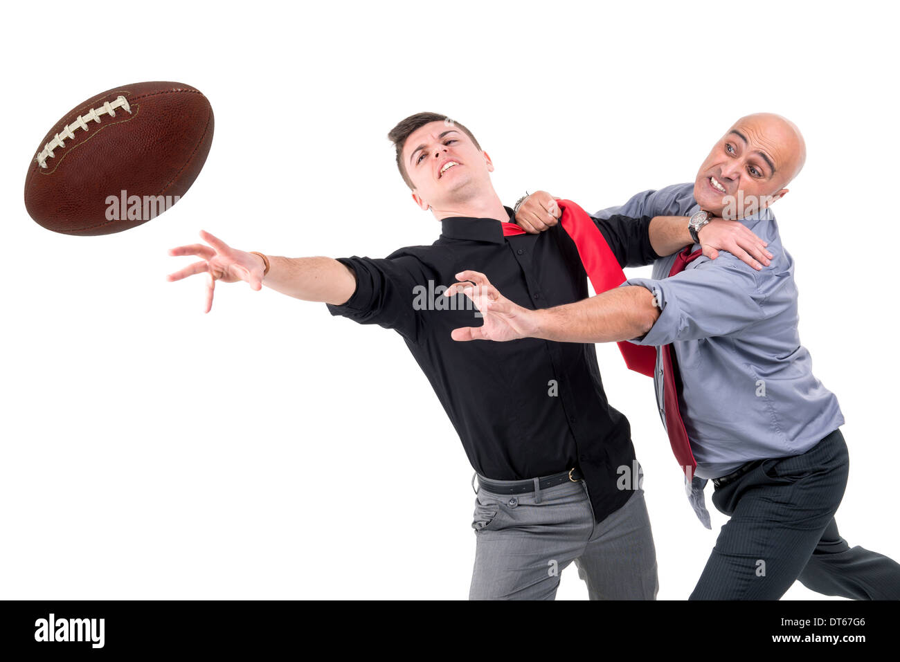 Businessmen playing rugby isolated in white Stock Photo - Alamy