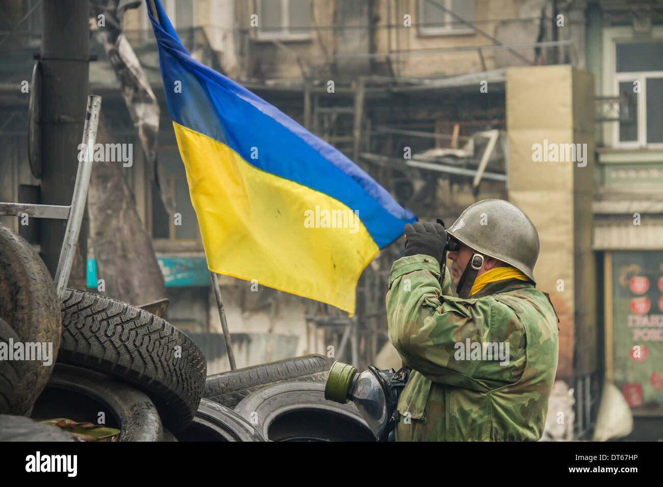 Anti-Government Euromaidan protesters remain on-guard at the barricades ...