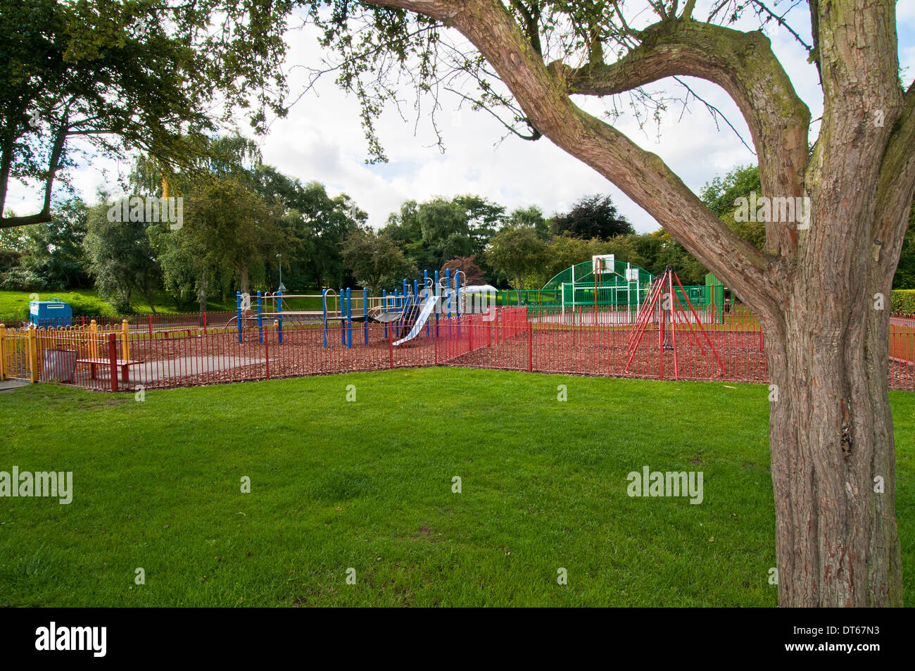 View of a playground in public park Stock Photo - Alamy