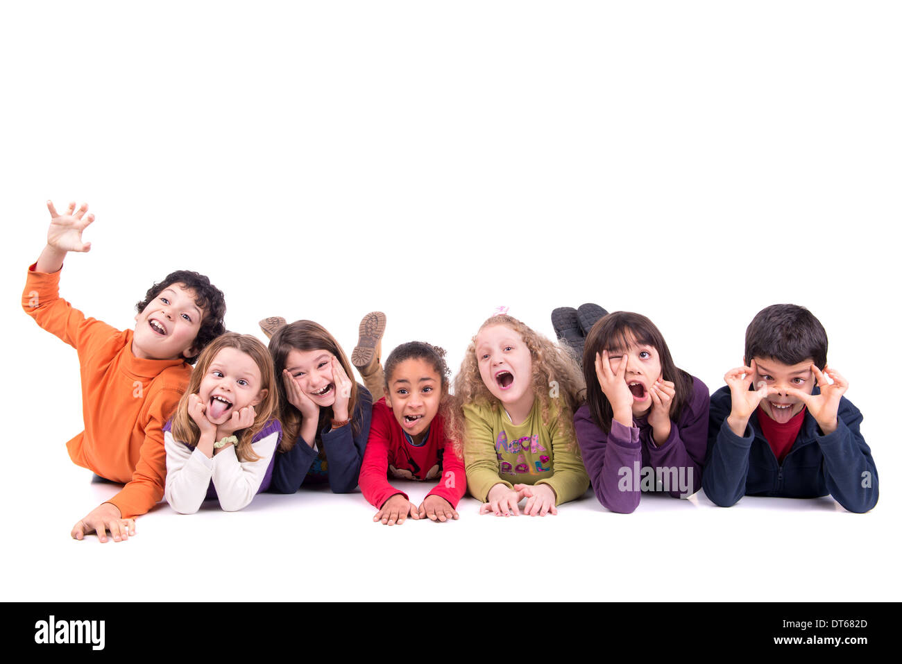Portrait group children making faces hi-res stock photography and ...