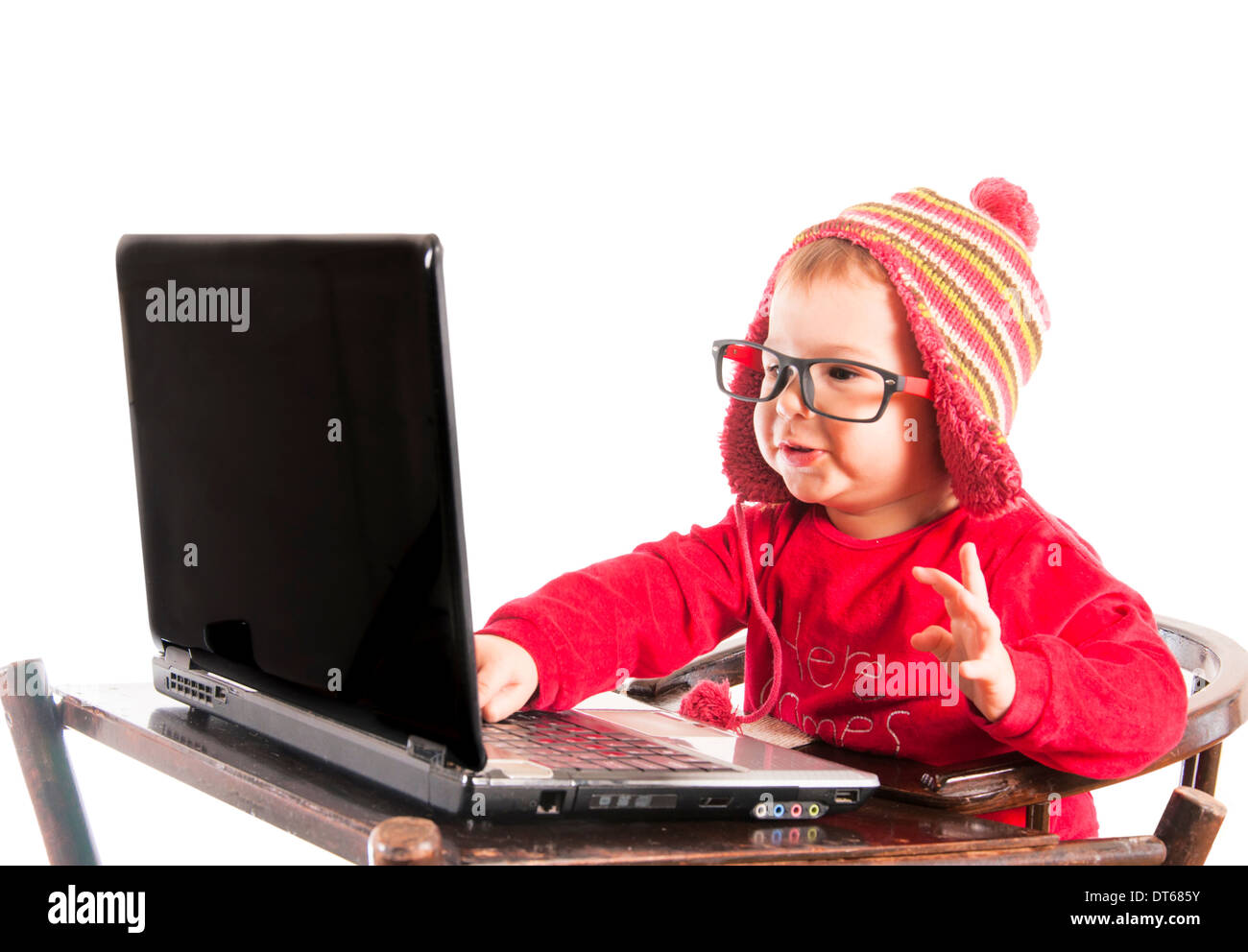 Little child hacker typing on the laptop computer,isolated on white ...