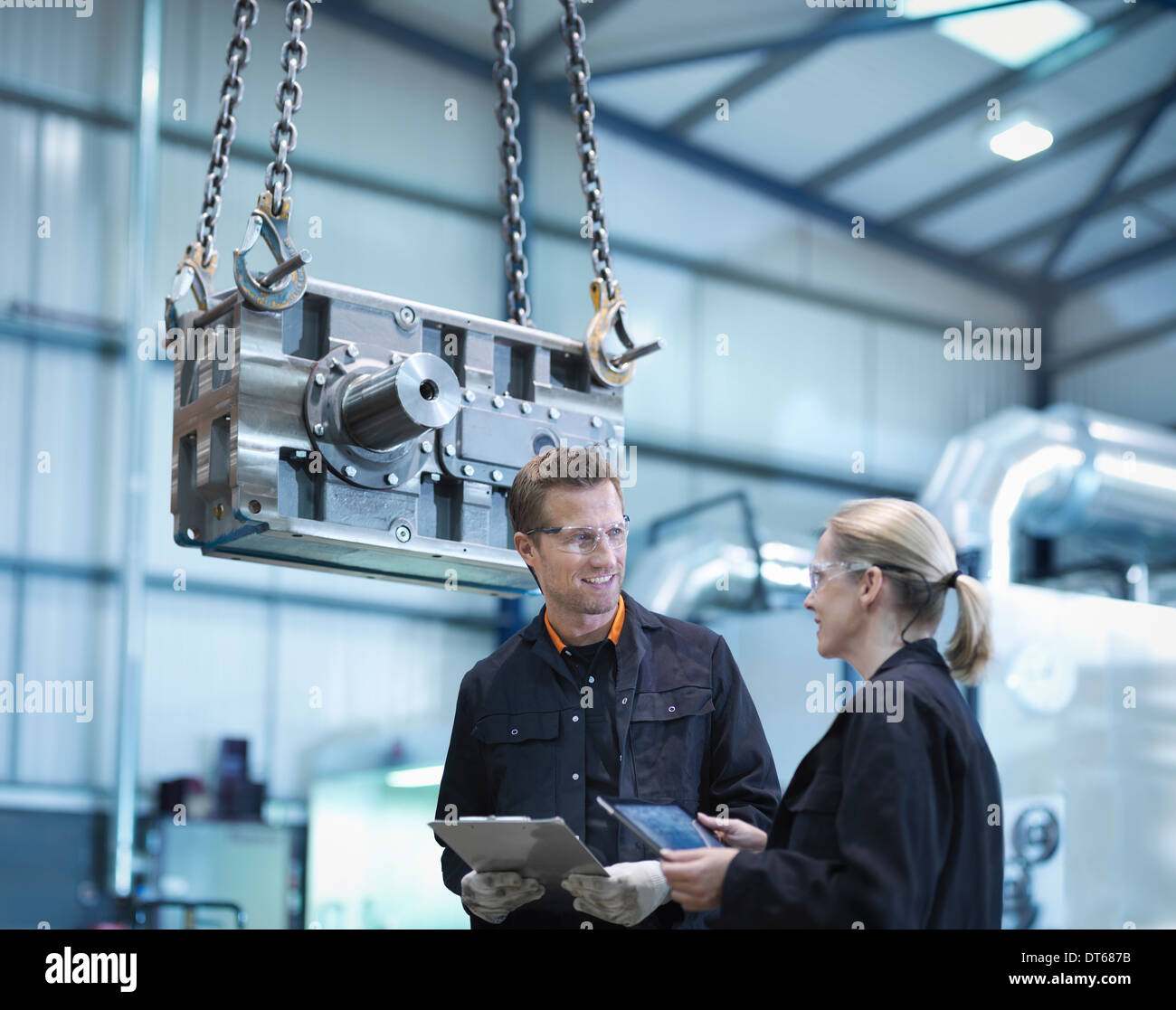Two engineers plans hi-res stock photography and images - Alamy