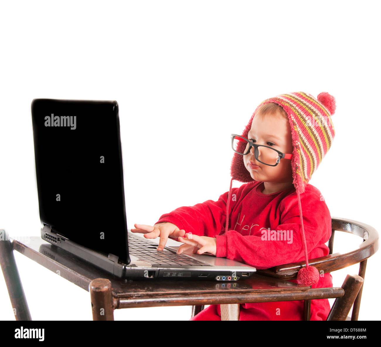 Little baby hacker typing on the laptop computer,isolated on white ...