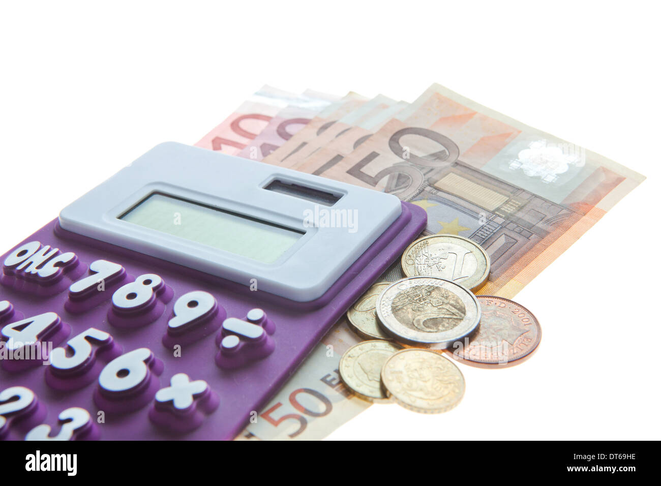 Arrangement of Calculator, Euro notes and Euro coins isolated on white ...
