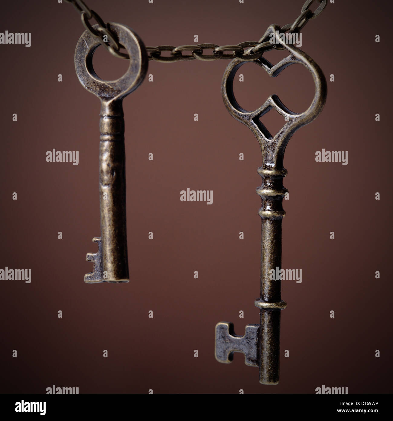 picture of an old keys on a brown background Stock Photo - Alamy