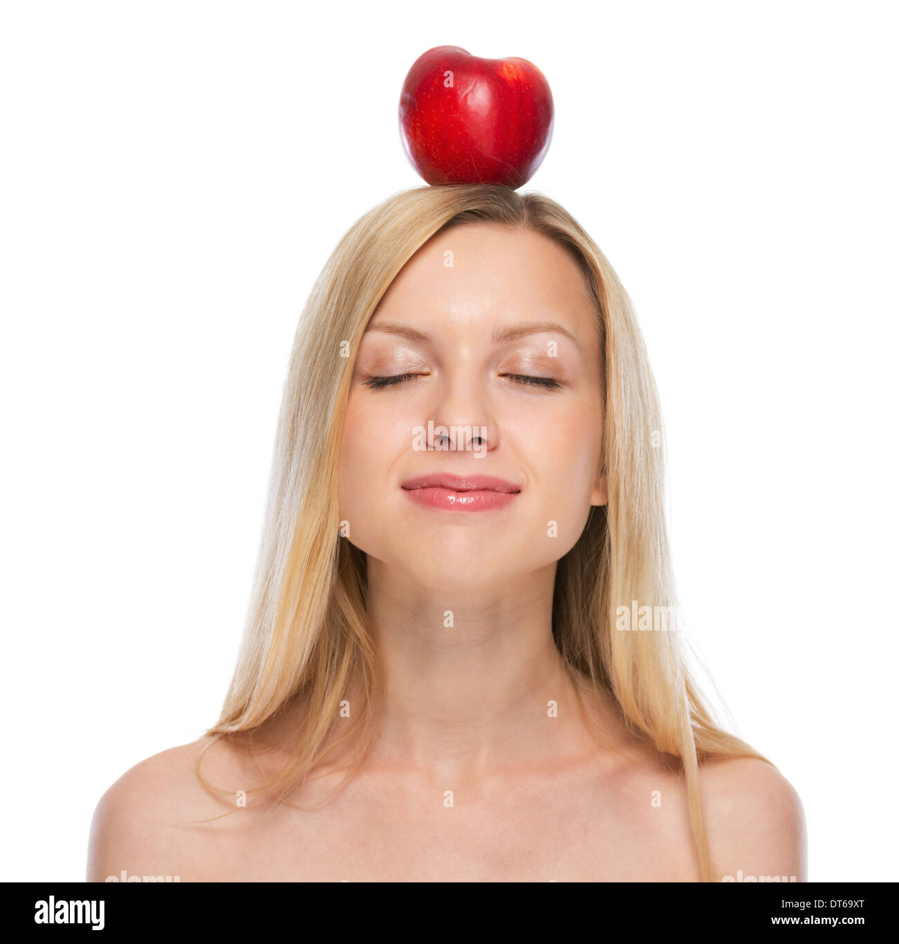 Young woman with apple on head Stock Photo - Alamy