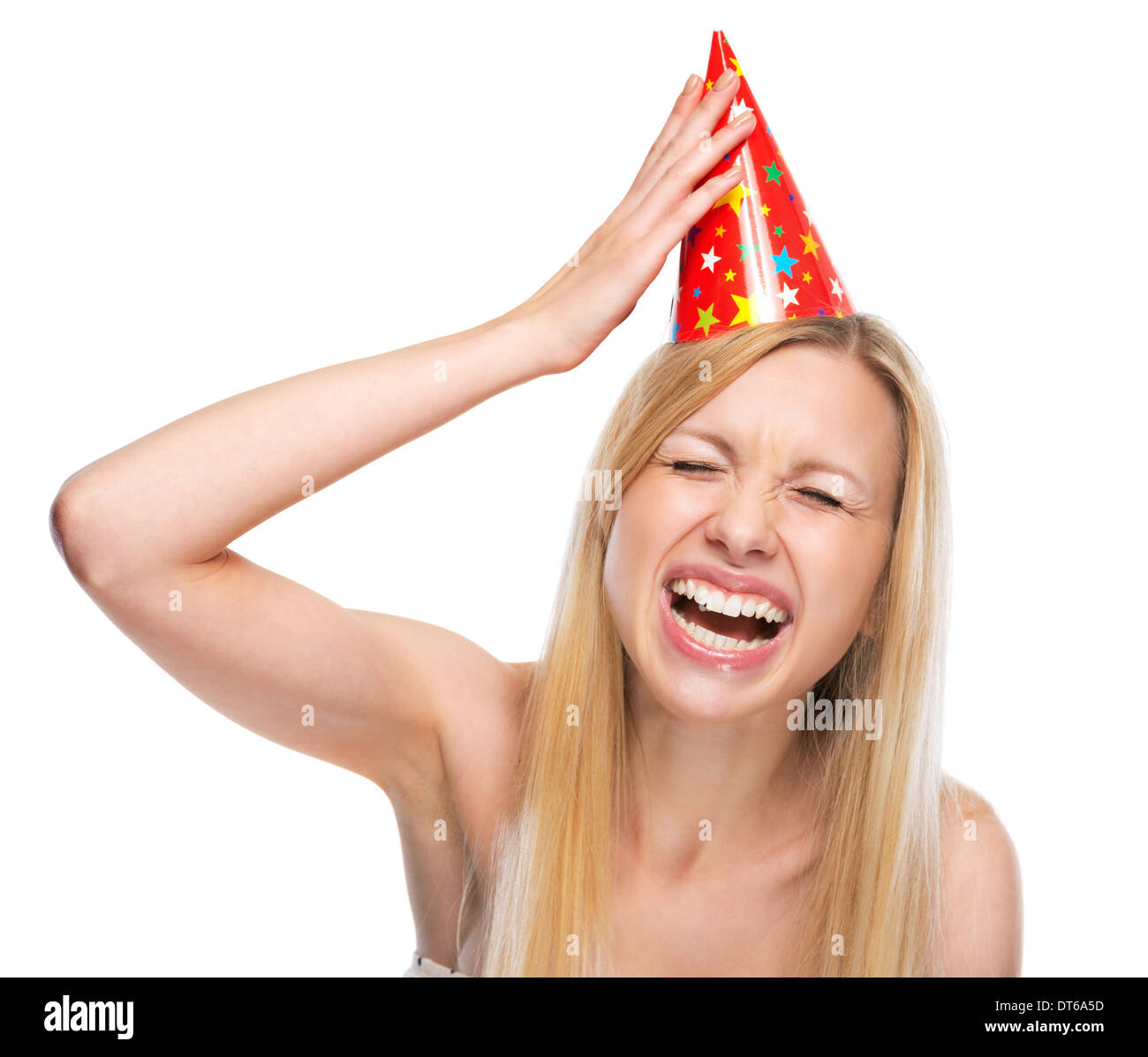 Smiling young woman in party cap Stock Photo - Alamy