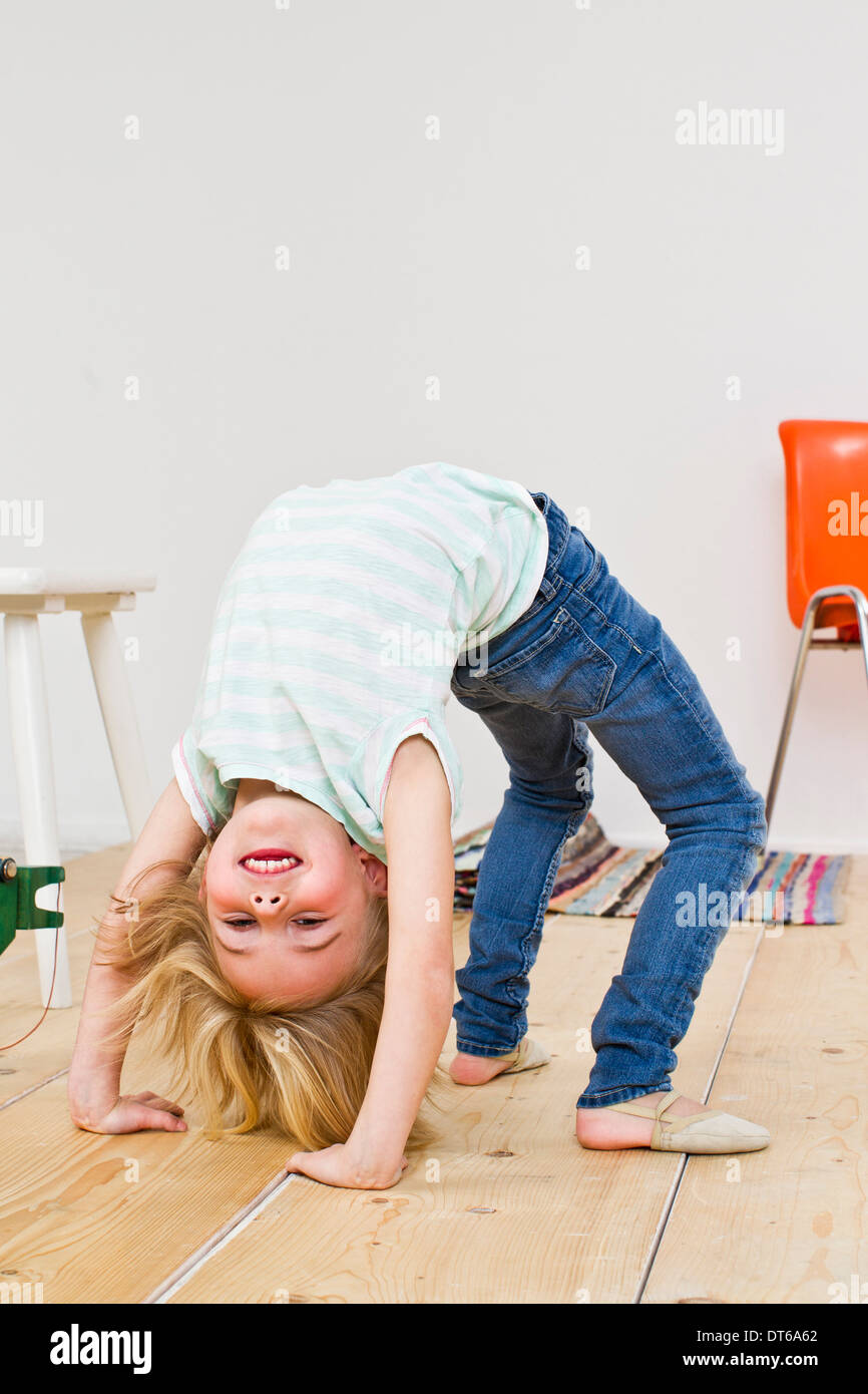 Girl bending over hi-res stock photography and images - Alamy