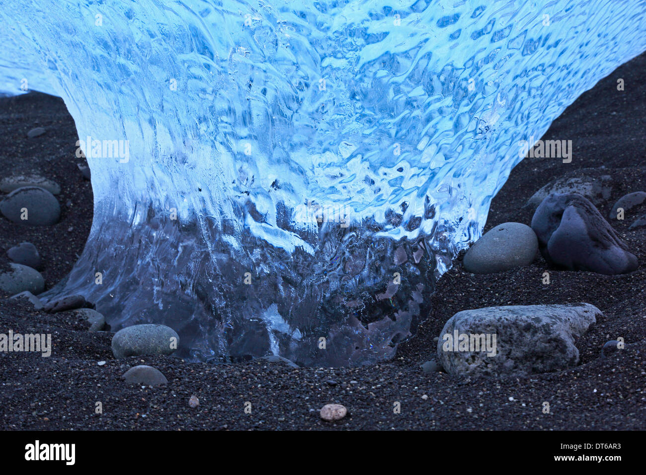 View of the base of an ice block on the beach at Glacier Lagoon Iceland ...