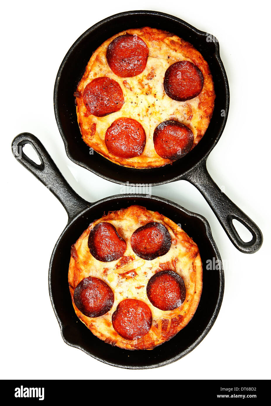 Two Single Serve Skillet Pepperoni Pizzas Over White Stock Photo - Alamy