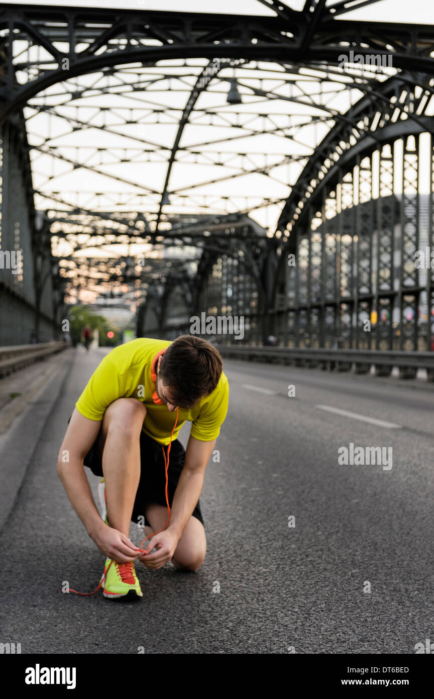Kneeling forward bend hi-res stock photography and images - Alamy