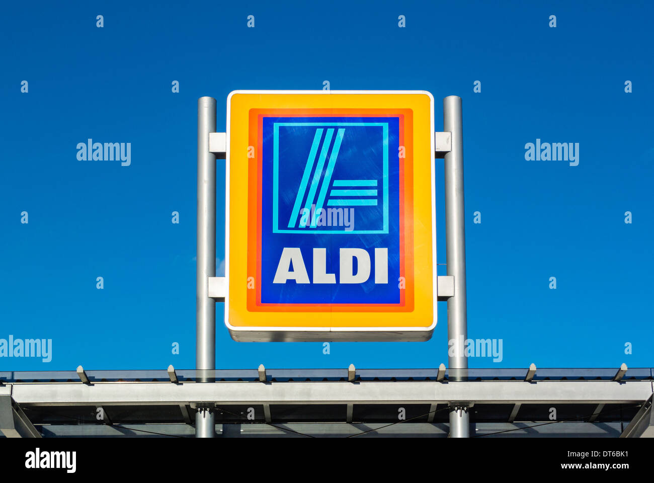 ALDI supermarket sign seen against a blue sky Stock Photo - Alamy