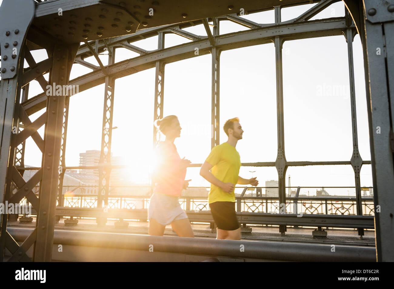 Couple running across hi-res stock photography and images - Alamy
