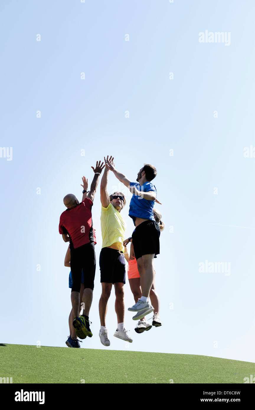 Group of mature adults jumping hi-res stock photography and images - Alamy