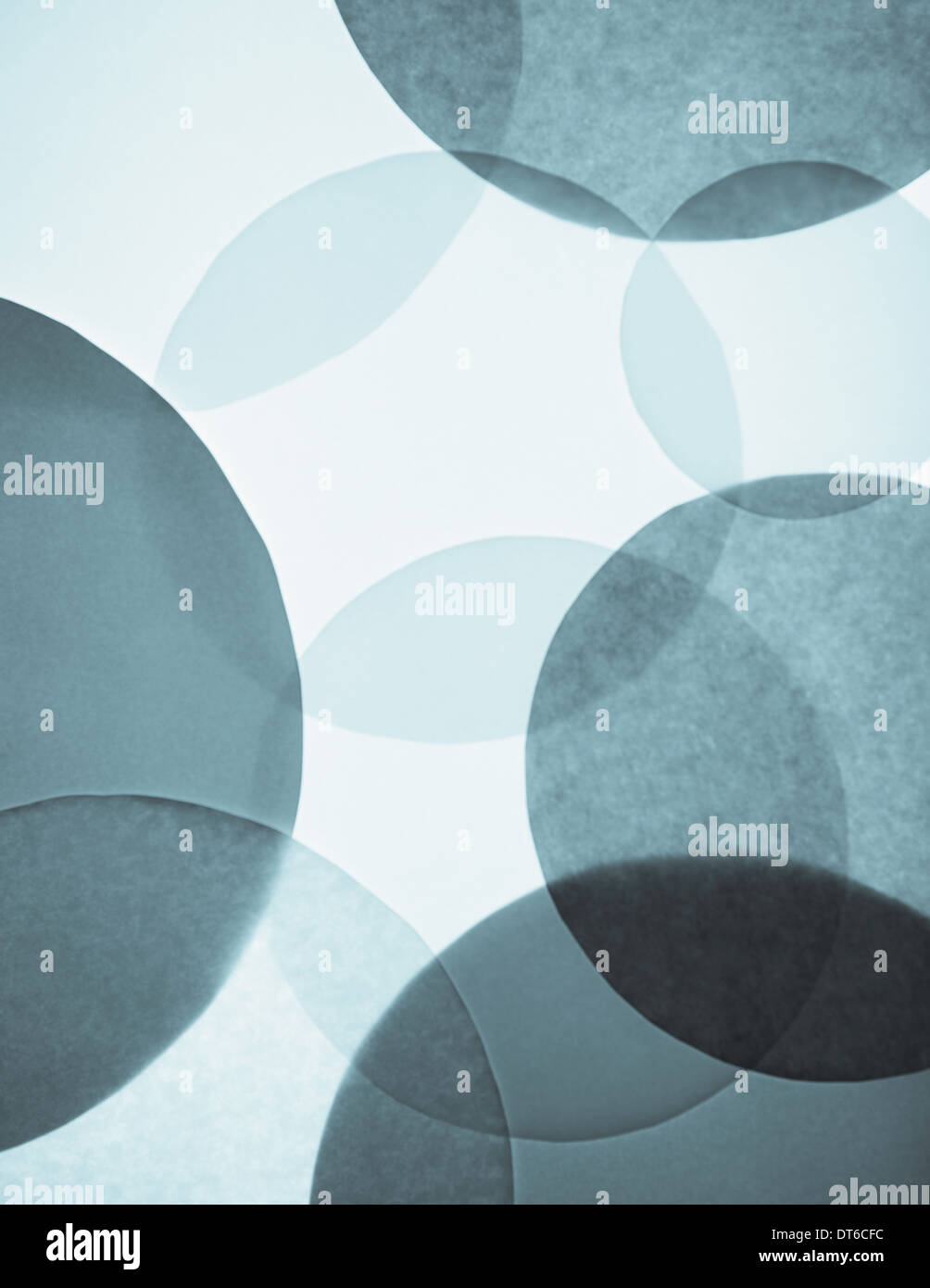 Overlapping circular shapes in various shades of blue Stock Photo - Alamy