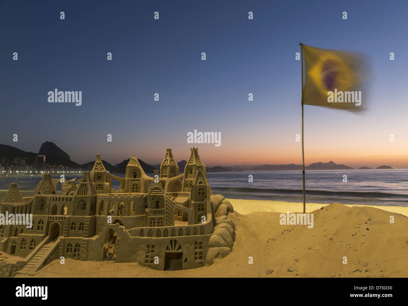 Sandcastle and Brazilian flag on Copacabana beach, Rio De Janeiro ...