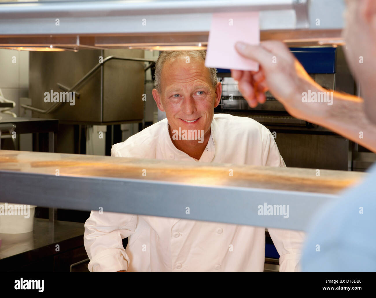 Mature male chef in hi-res stock photography and images - Alamy