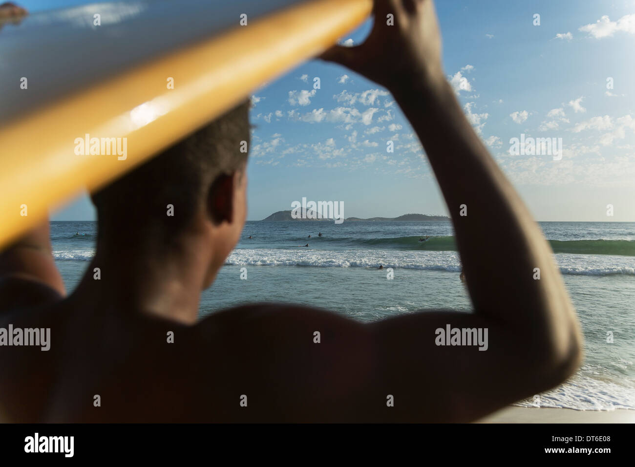 Male Surfer Carrying Surfboard High Resolution Stock Photography and ...