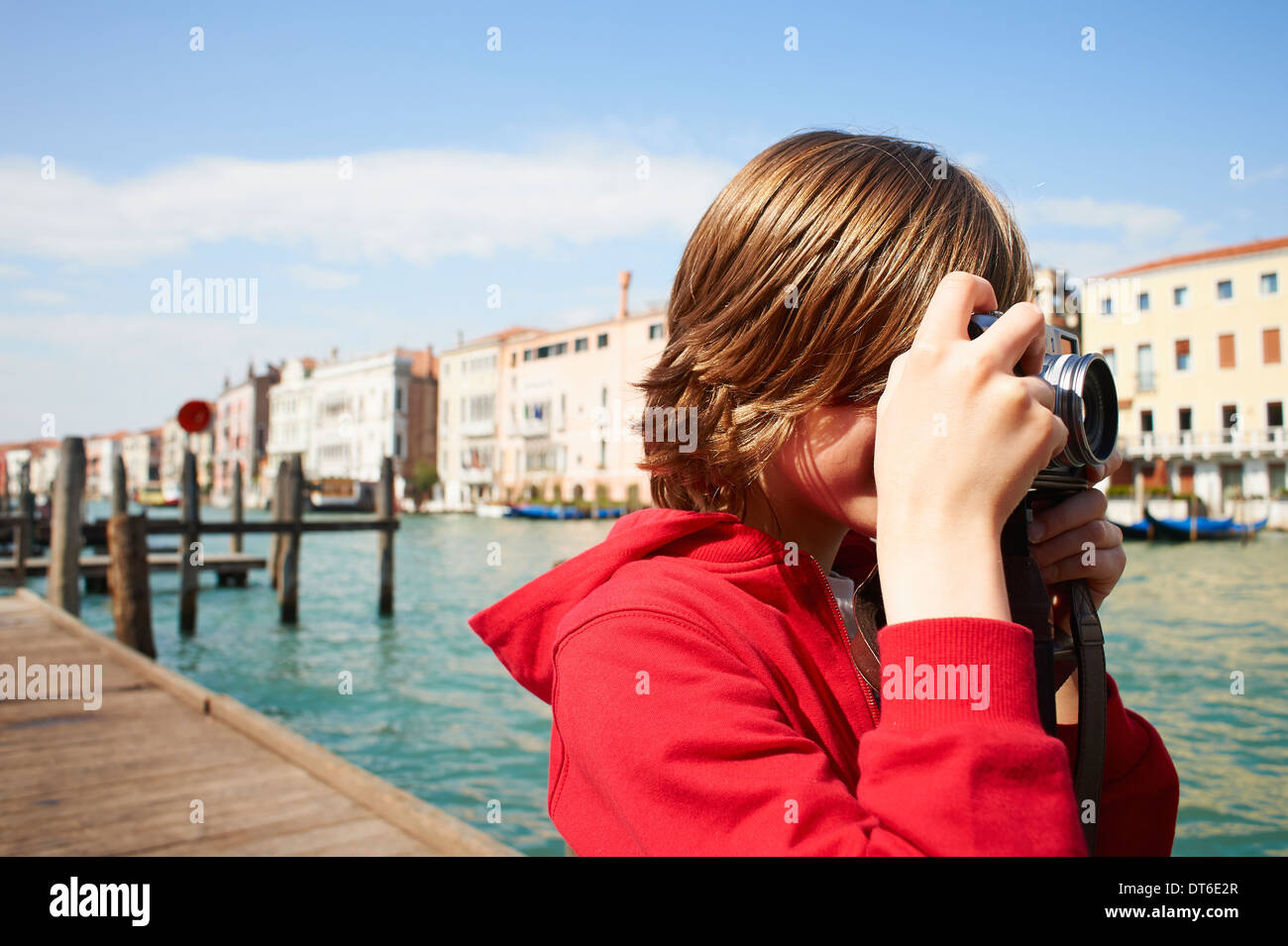 Young boy taking photographs on camera,Venice, Italy Stock Photo - Alamy