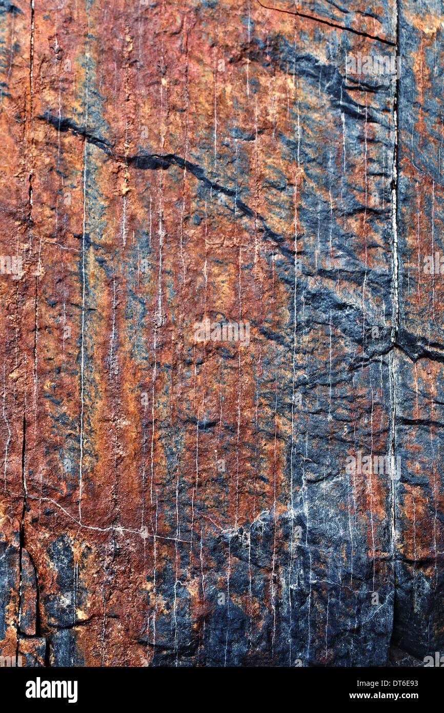 Colored stone texture with cracks close up Stock Photo - Alamy