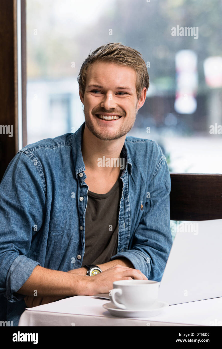 Portrait man laptop on head hi-res stock photography and images - Alamy