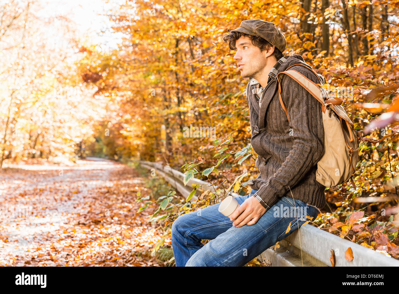 Man sitting fence hi-res stock photography and images - Alamy