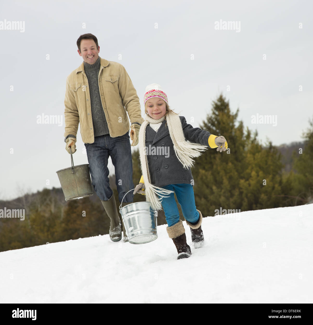 Carrying water with buckets hi-res stock photography and images - Alamy