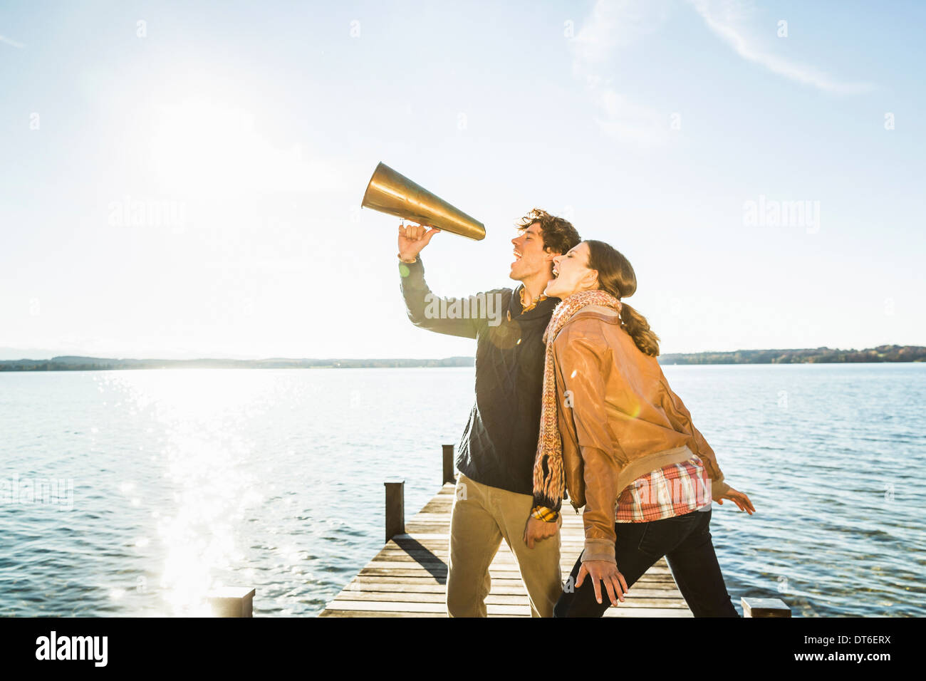 Two people megaphone hi-res stock photography and images - Alamy
