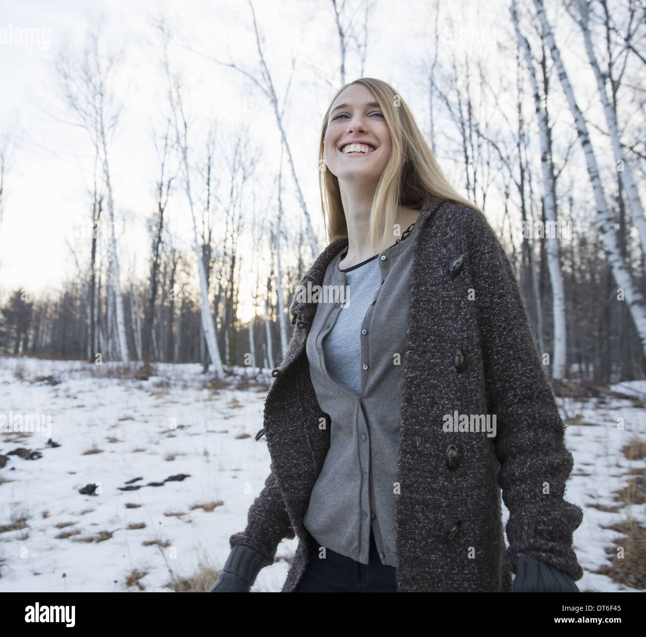Woman hair blonde winter smiling hi-res stock photography and images ...