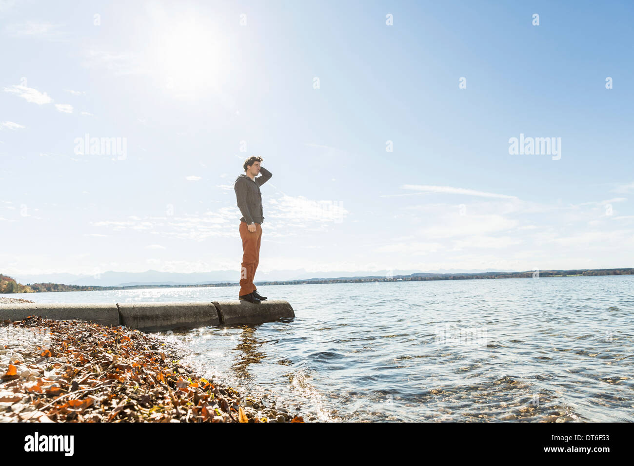 Man standing on jetty hi-res stock photography and images - Alamy