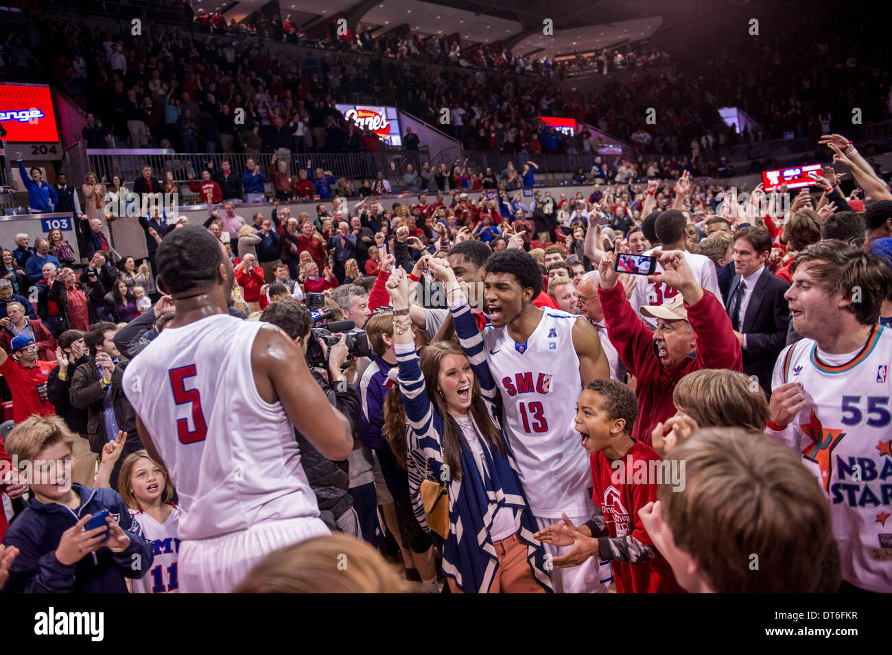 Dallas, Tx, USA. 10th Feb, 2014. SMU fans celebrate with SMU players ...