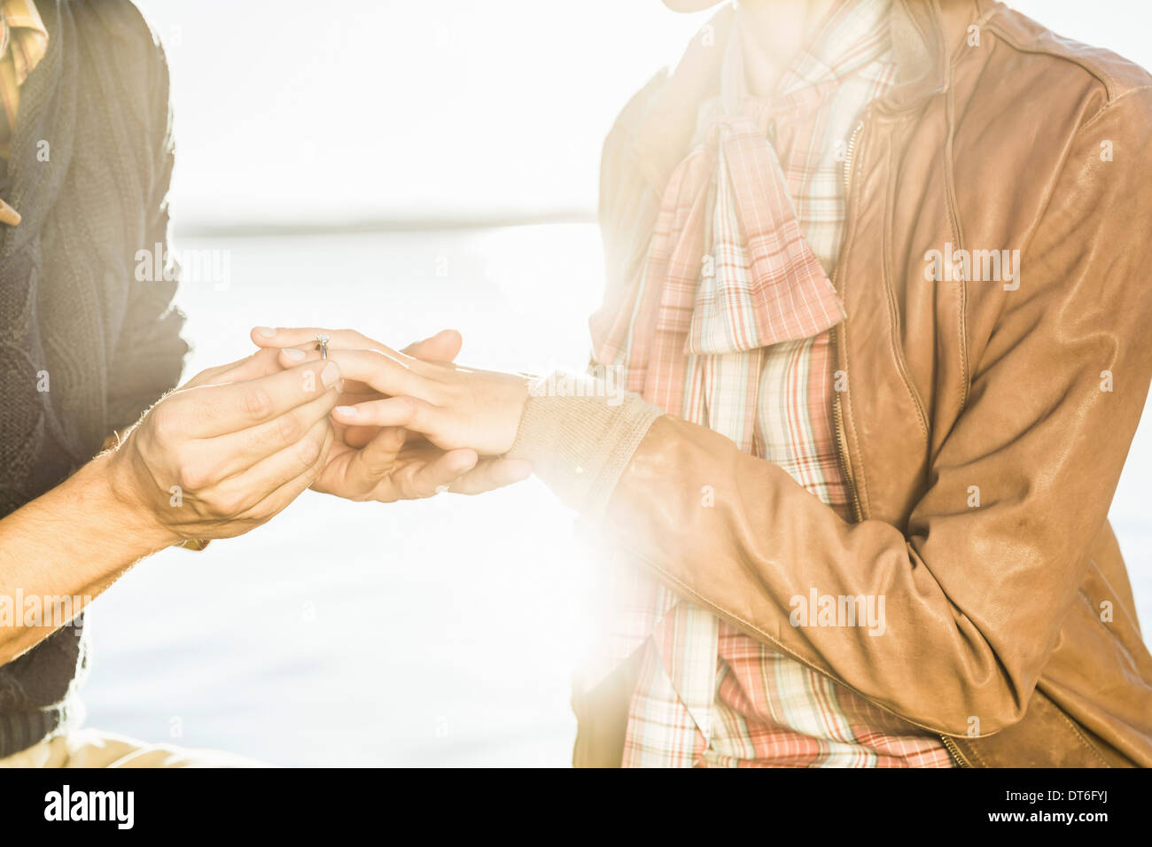 Putting on ring hi-res stock photography and images - Alamy