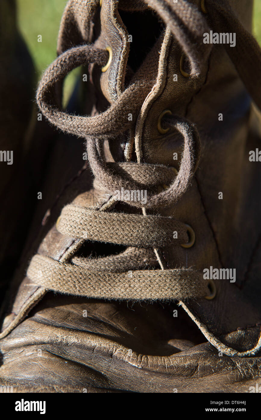 An old boot with laces Stock Photo - Alamy