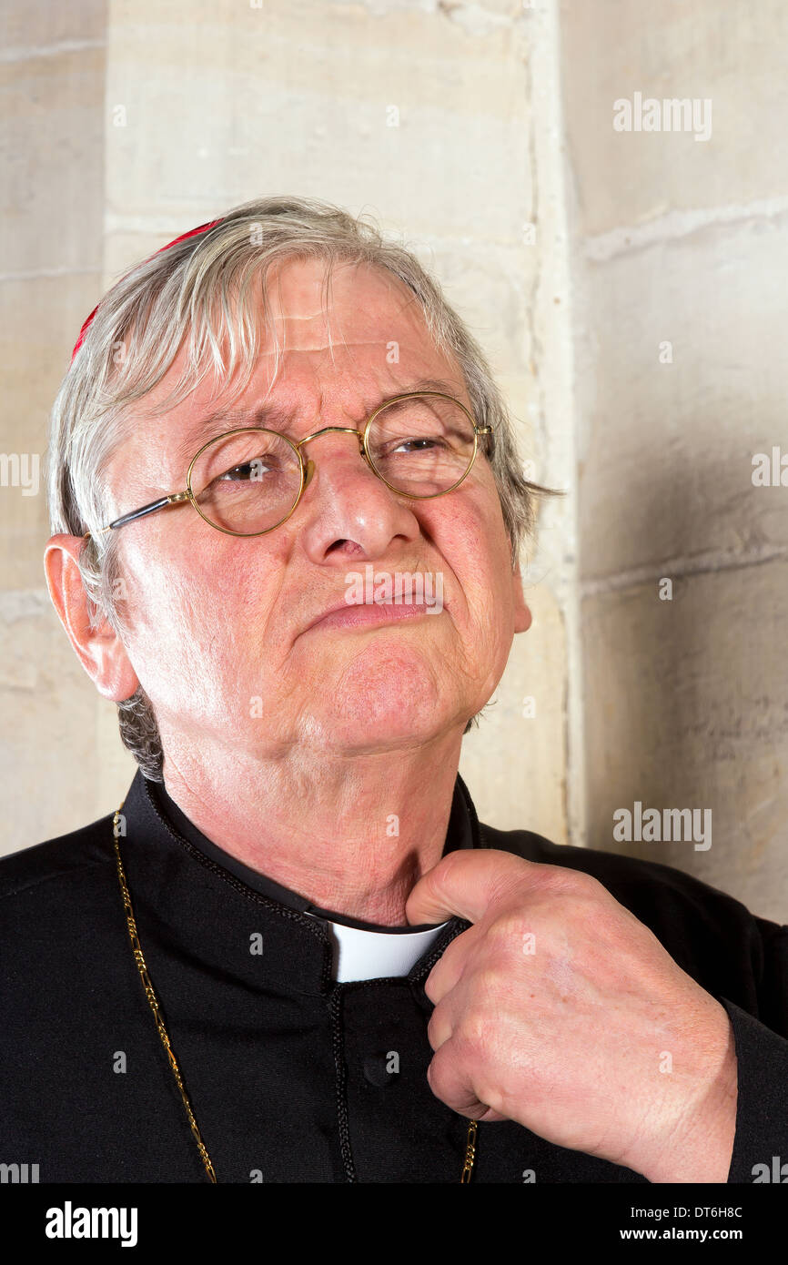 Priest wearing cassock hi-res stock photography and images - Alamy