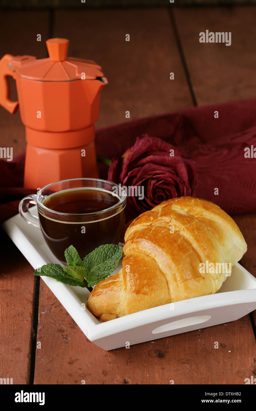 elegant coffee break or breakfast cup of coffee and croissant Stock ...