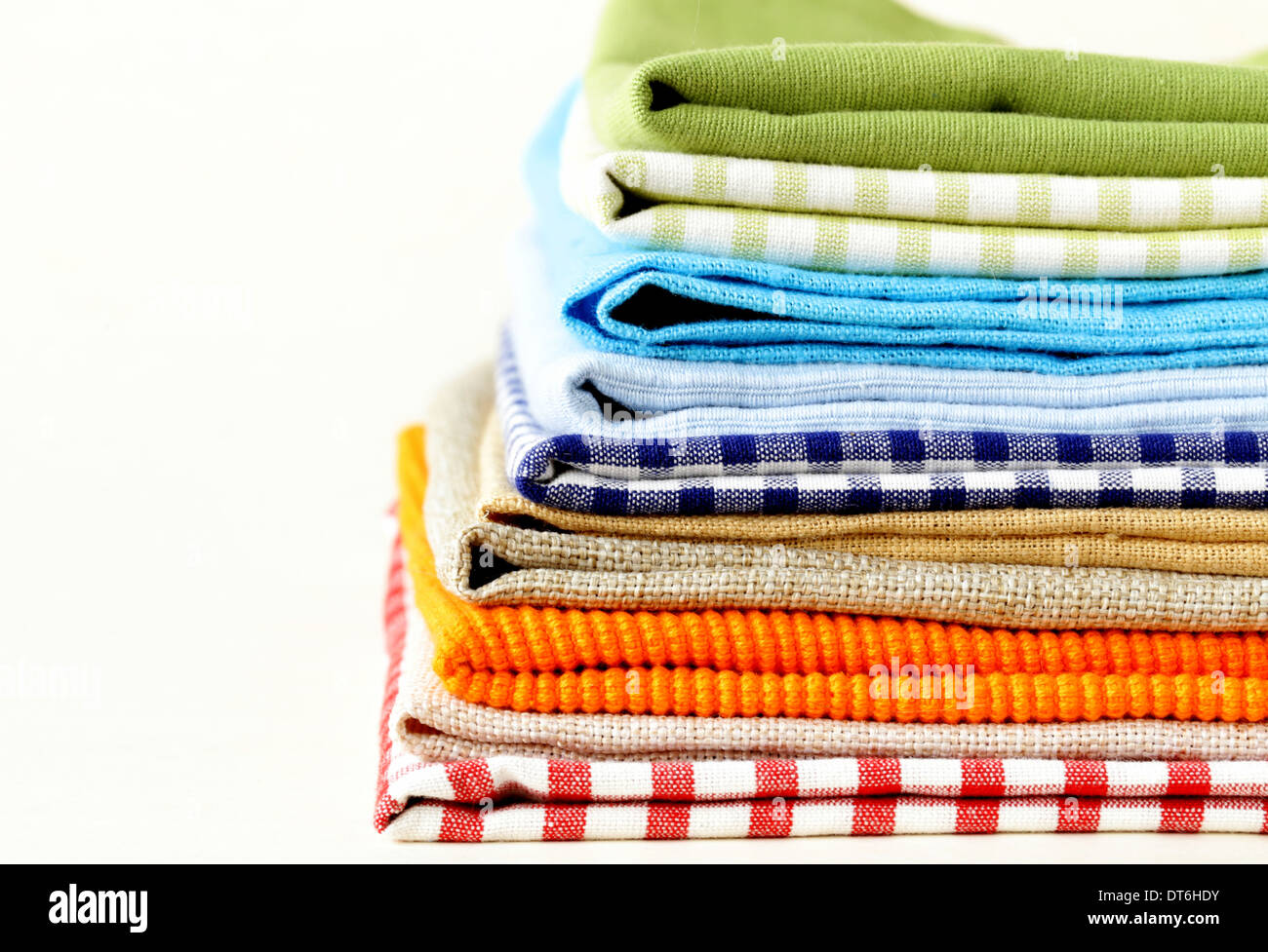 stack of colorful kitchen napkins on white background Stock Photo - Alamy