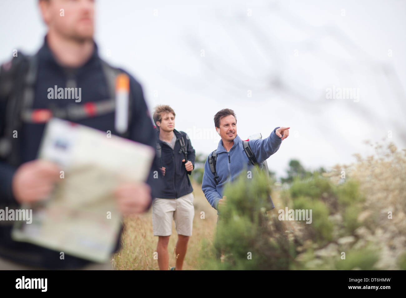 Male hikers map hi-res stock photography and images - Alamy