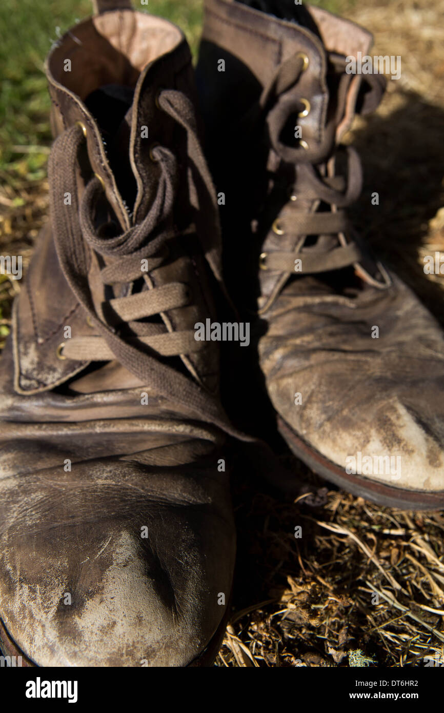 Pair of old boots hi-res stock photography and images - Alamy